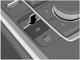 Depress the brake pedal with the vehicle power switched ON or the ...